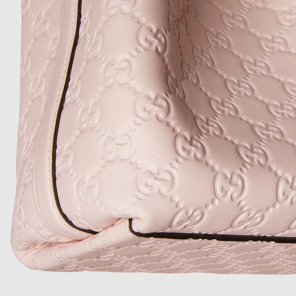 GG Emblem small bucket bag in pink GG leather | GUCCI® US