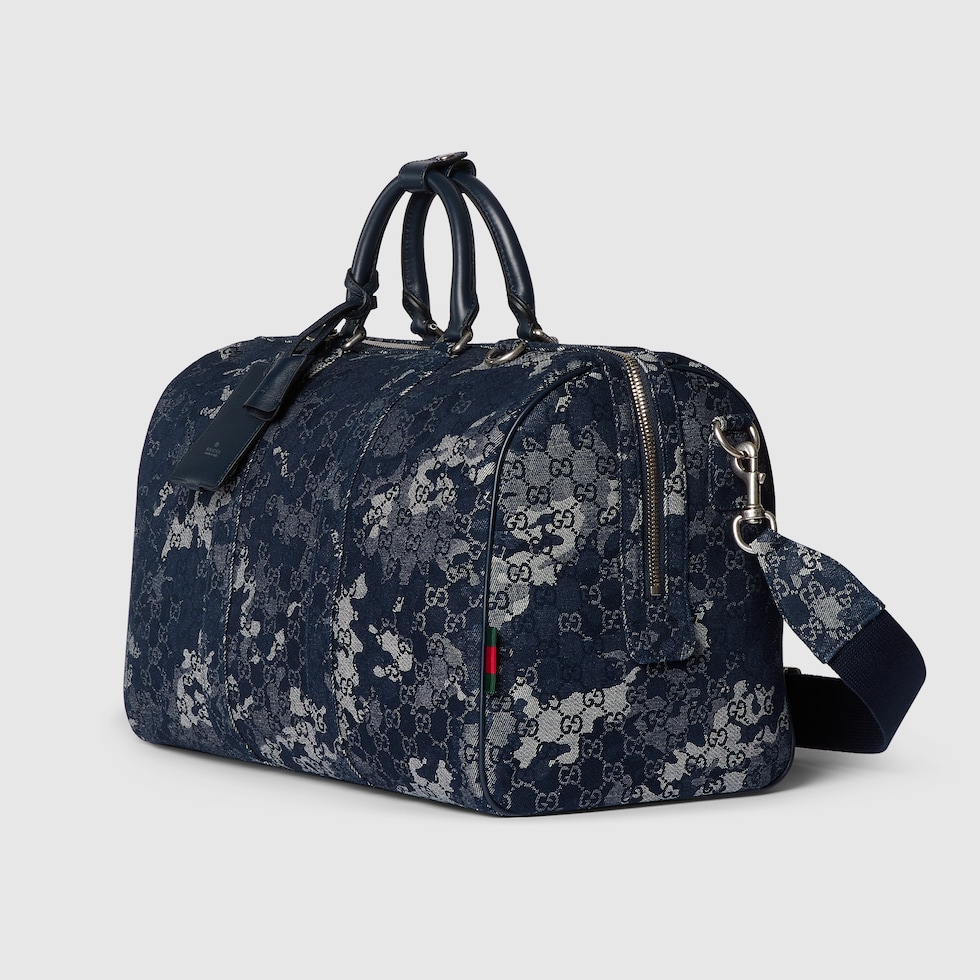 GG denim duffle bag in dark blue GG denim | GUCCI® CA