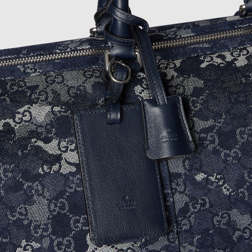 GG denim duffle bag in dark blue GG denim | GUCCI® ZA
