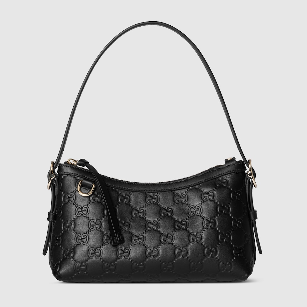 GG Emblem small shoulder bag in black GG leather | GUCCI® RO
