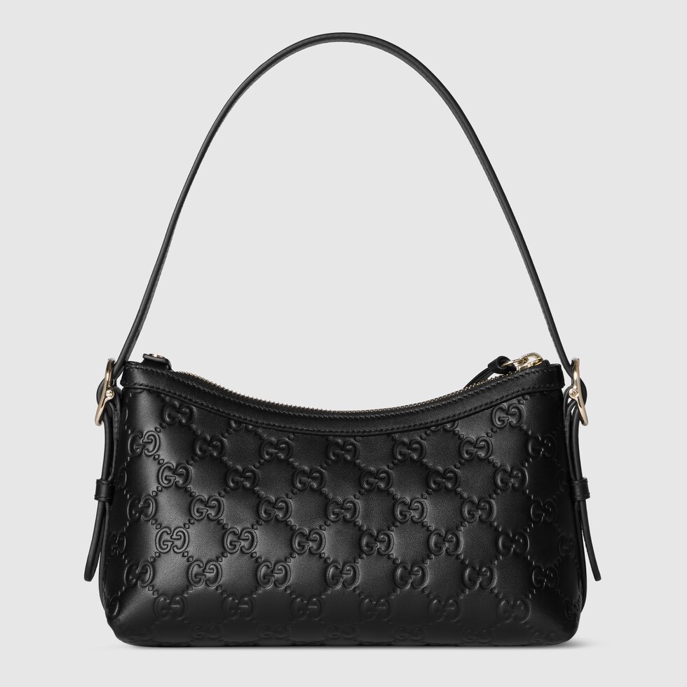 GG Emblem small shoulder bag in black GG leather | GUCCI® AE