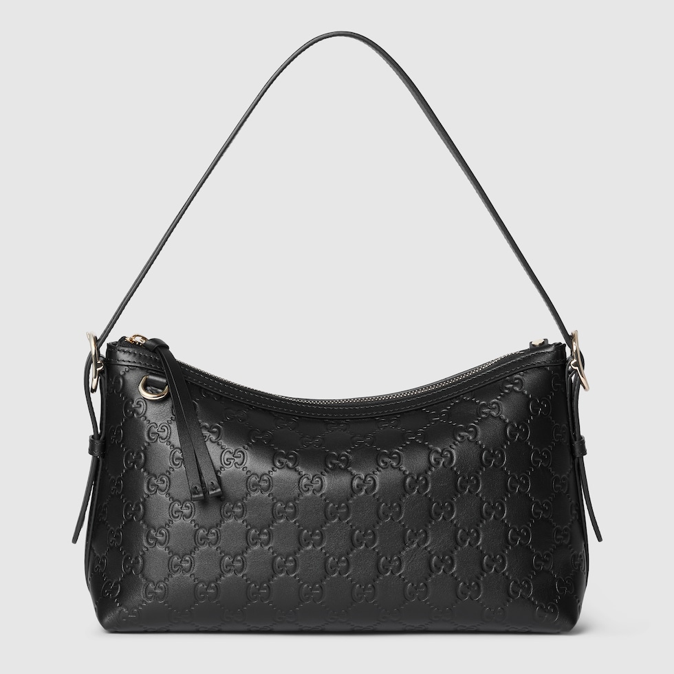 GG Emblem medium shoulder bag in black GG leather | GUCCI® CA