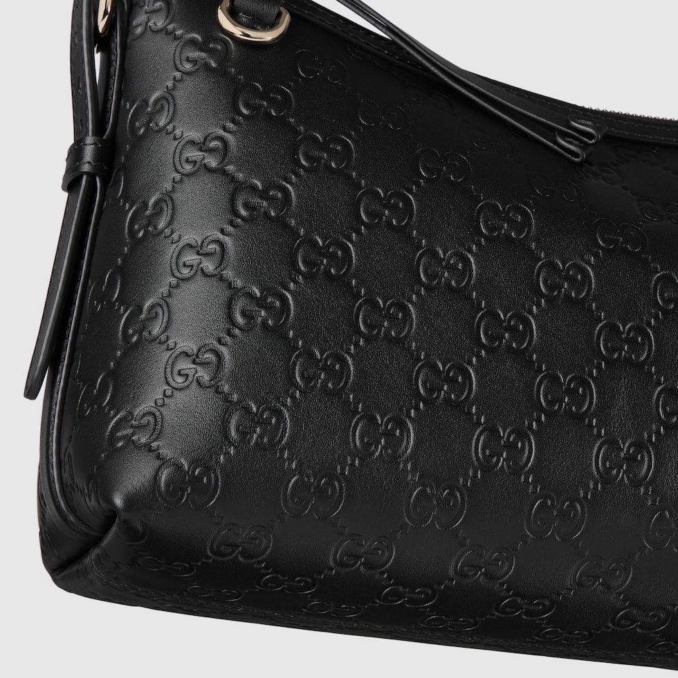 GG Emblem medium shoulder bag in black GG leather | GUCCI® SG