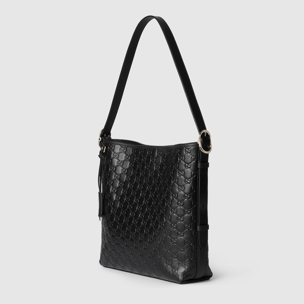GG Emblem medium shoulder bag in black GG leather | GUCCI® UK