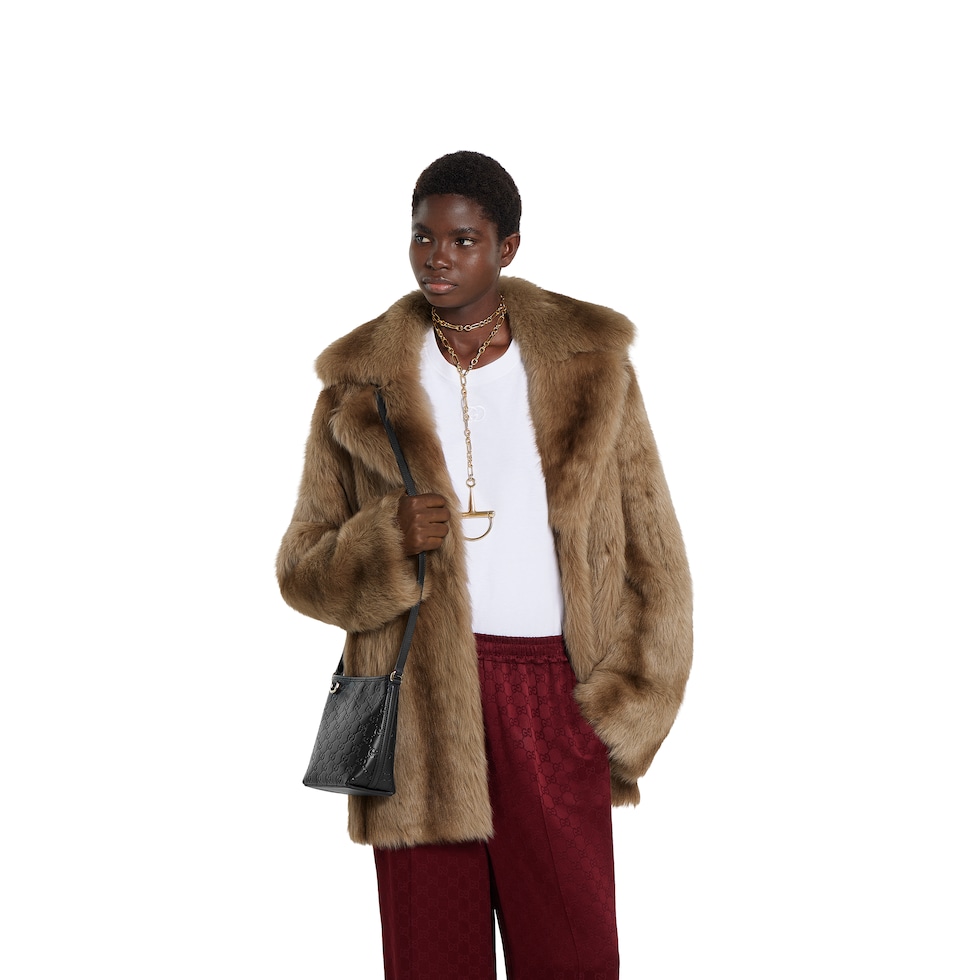 GG Emblem Nano Bucket Bag in schwarzes GG Leder | GUCCI® DE