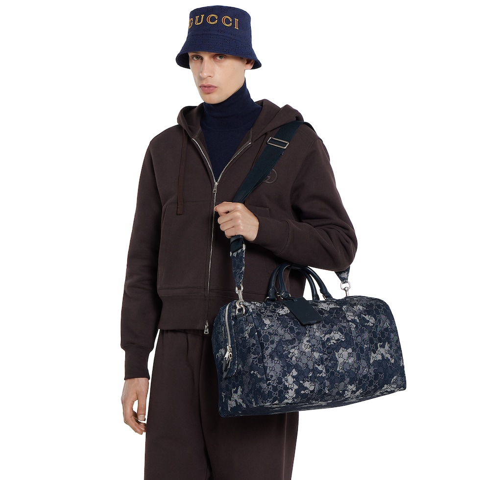 GG denim duffle bag in dark blue GG denim | GUCCI® ZA