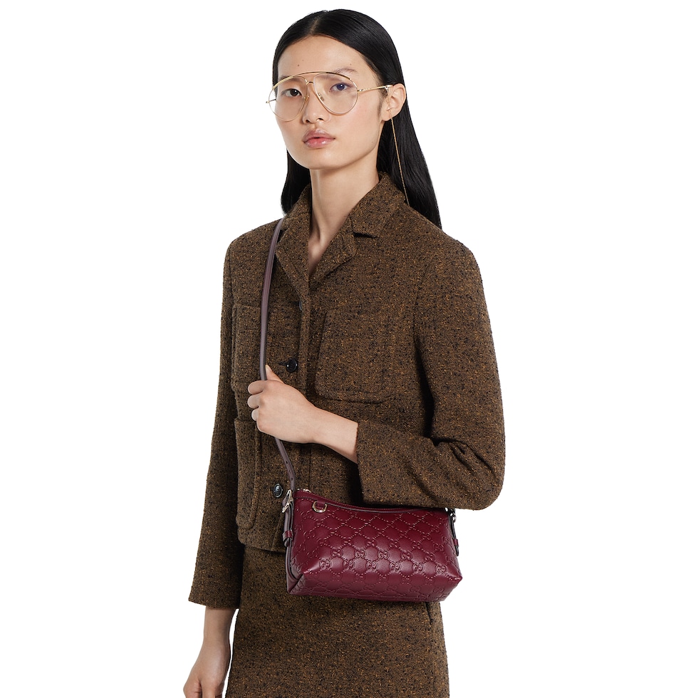 GG Emblem small shoulder bag in Rosso Ancora red GG leather | GUCCI® UK