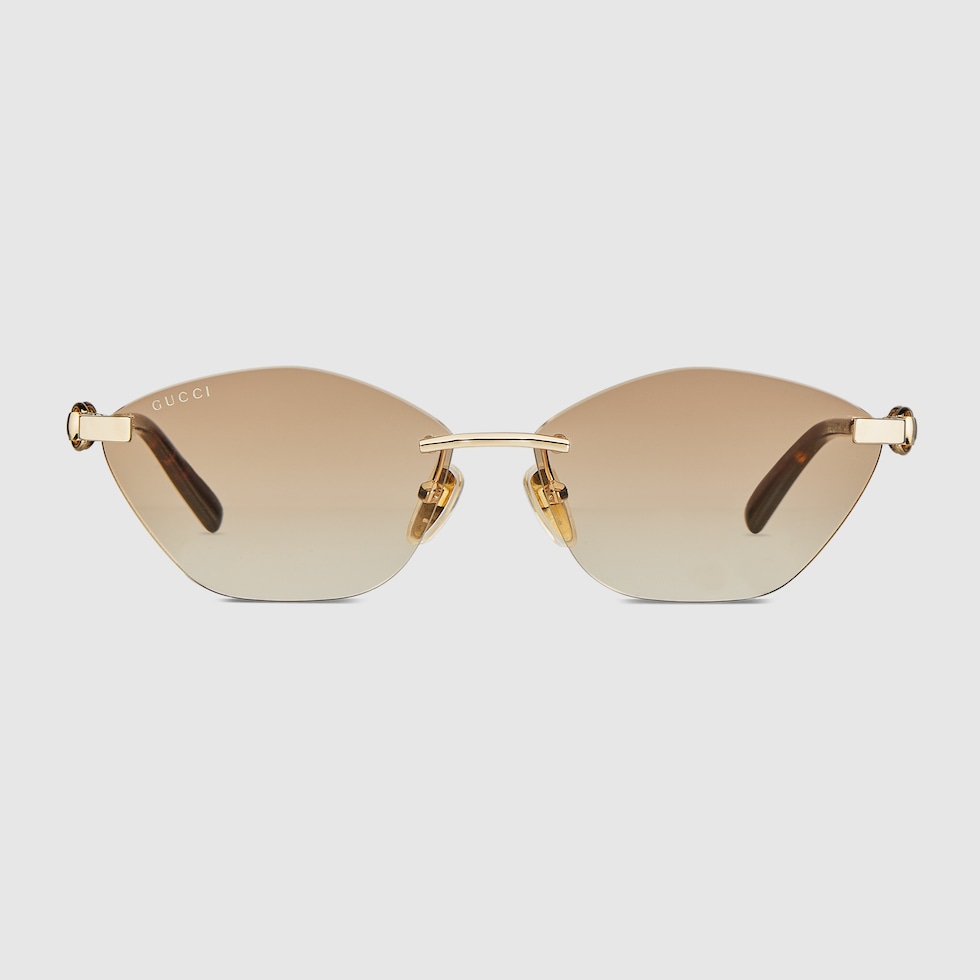Lunettes de soleil à monture œil-de-chat en doré | GUCCI® FR