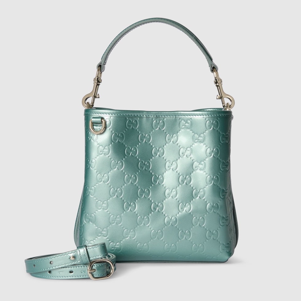 GG Emblem small bucket bag in light blue GG leather | GUCCI® UK