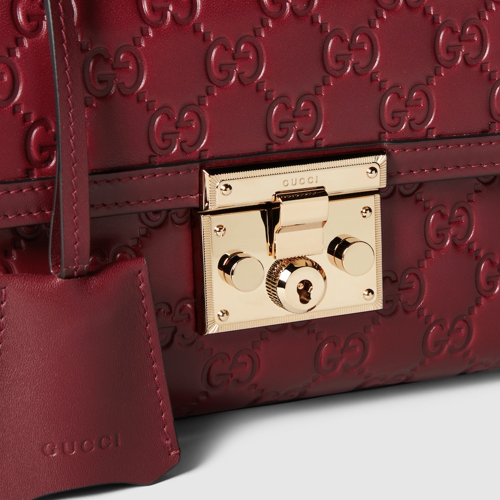Padlock small top handle bag in Rosso Ancora red GG leather | GUCCI® AE