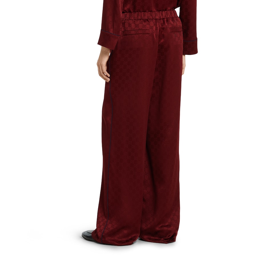 Pantalon en satin GG en rouge Rosso Ancora | GUCCI® FR