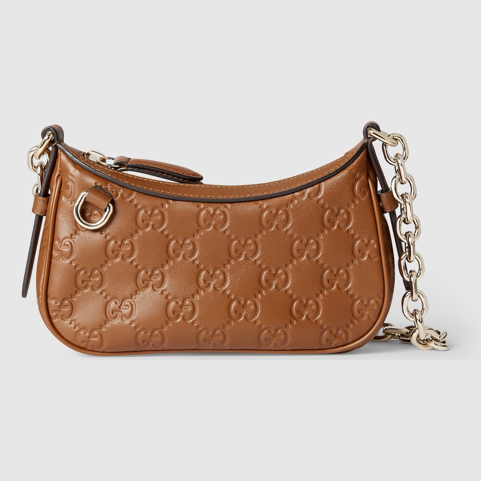 GG Emblem mini shoulder bag in brown GG leather | GUCCI® SG