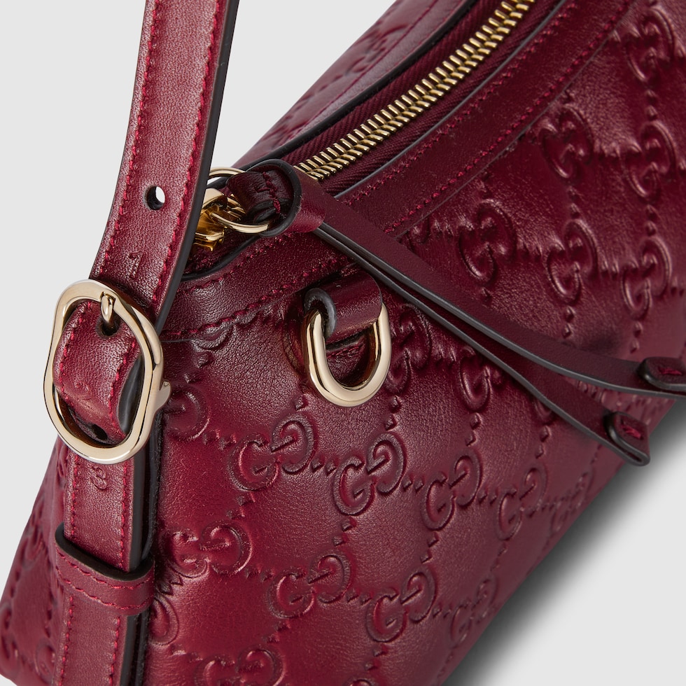 GG Emblem small shoulder bag in Rosso Ancora red GG leather | GUCCI® NL