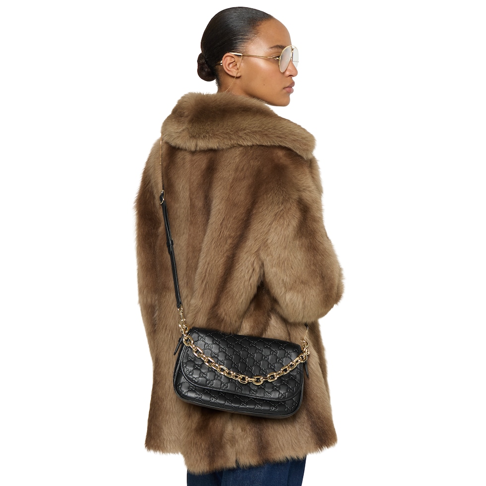 GG Emblem medium shoulder bag in black GG leather | GUCCI® CH