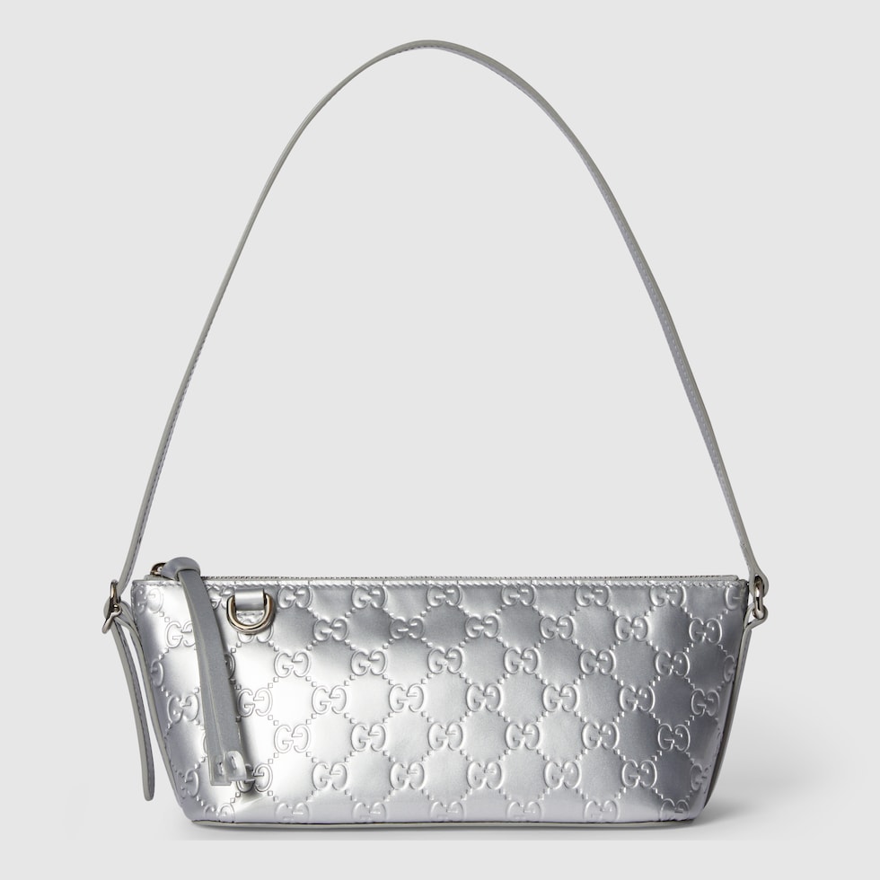 GG Emblem small shoulder bag in silver GG leather | GUCCI® SG