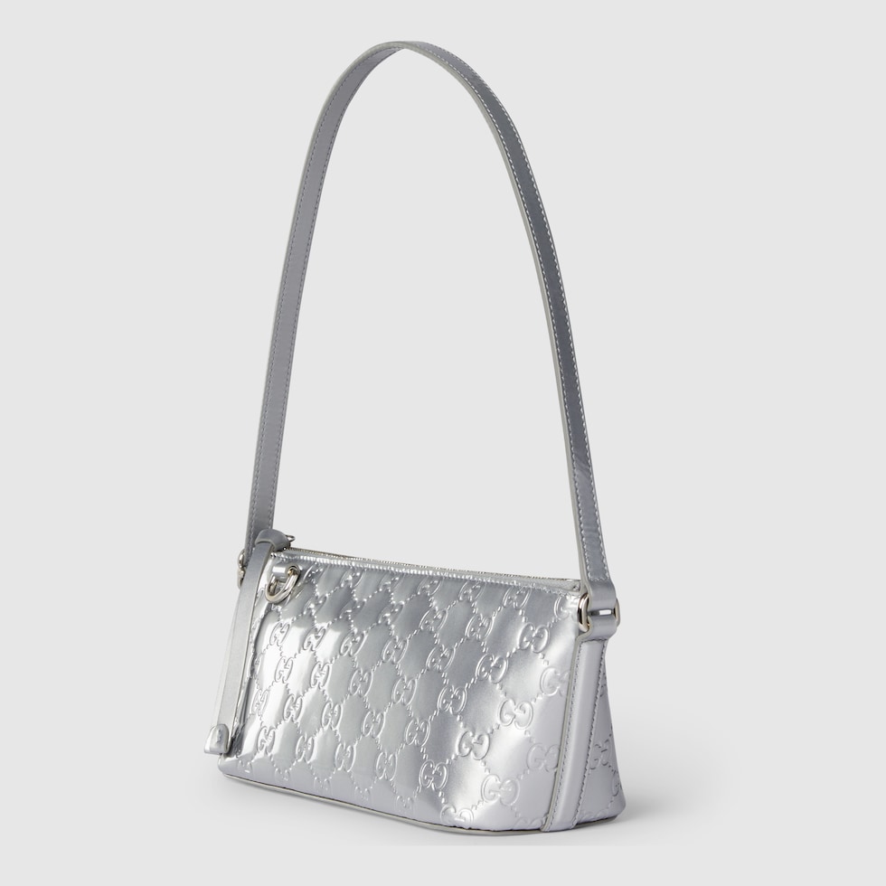 GG Emblem small shoulder bag in silver GG leather | GUCCI® SG