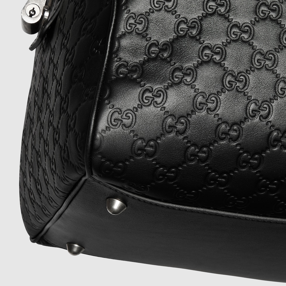 GG Emblem large duffle bag in black GG leather | GUCCI® US