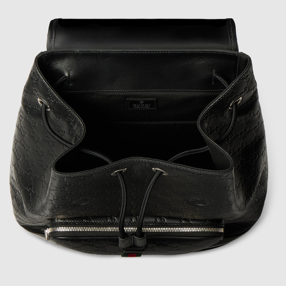 GG Emblem medium backpack in black GG leather | GUCCI® US