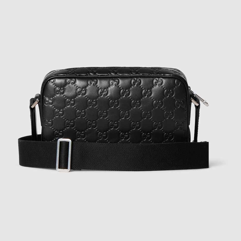 GG Emblem small crossbody bag in black GG leather | GUCCI® SG