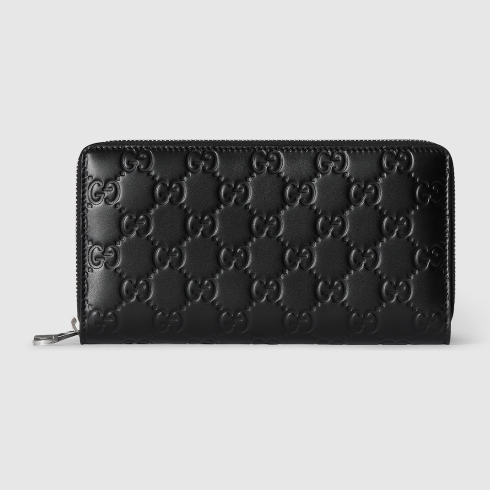 GG Emblem zip around wallet in black GG leather | GUCCI® US