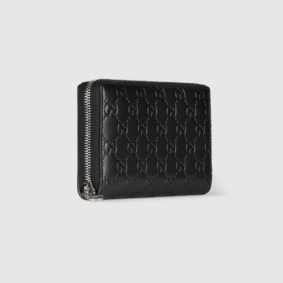 GG Emblem zip around wallet in black GG leather | GUCCI® US
