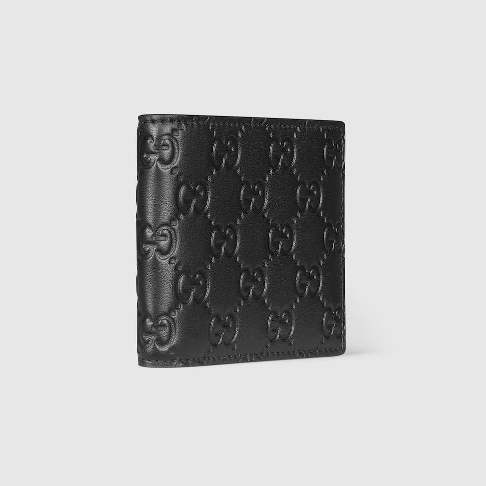 GG Emblem bi-fold wallet in black GG leather | GUCCI® US