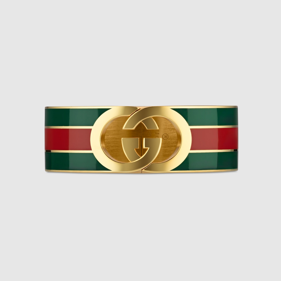 Bracciale rigido Gucci Interlocking in ottone color oro | GUCCI® IT