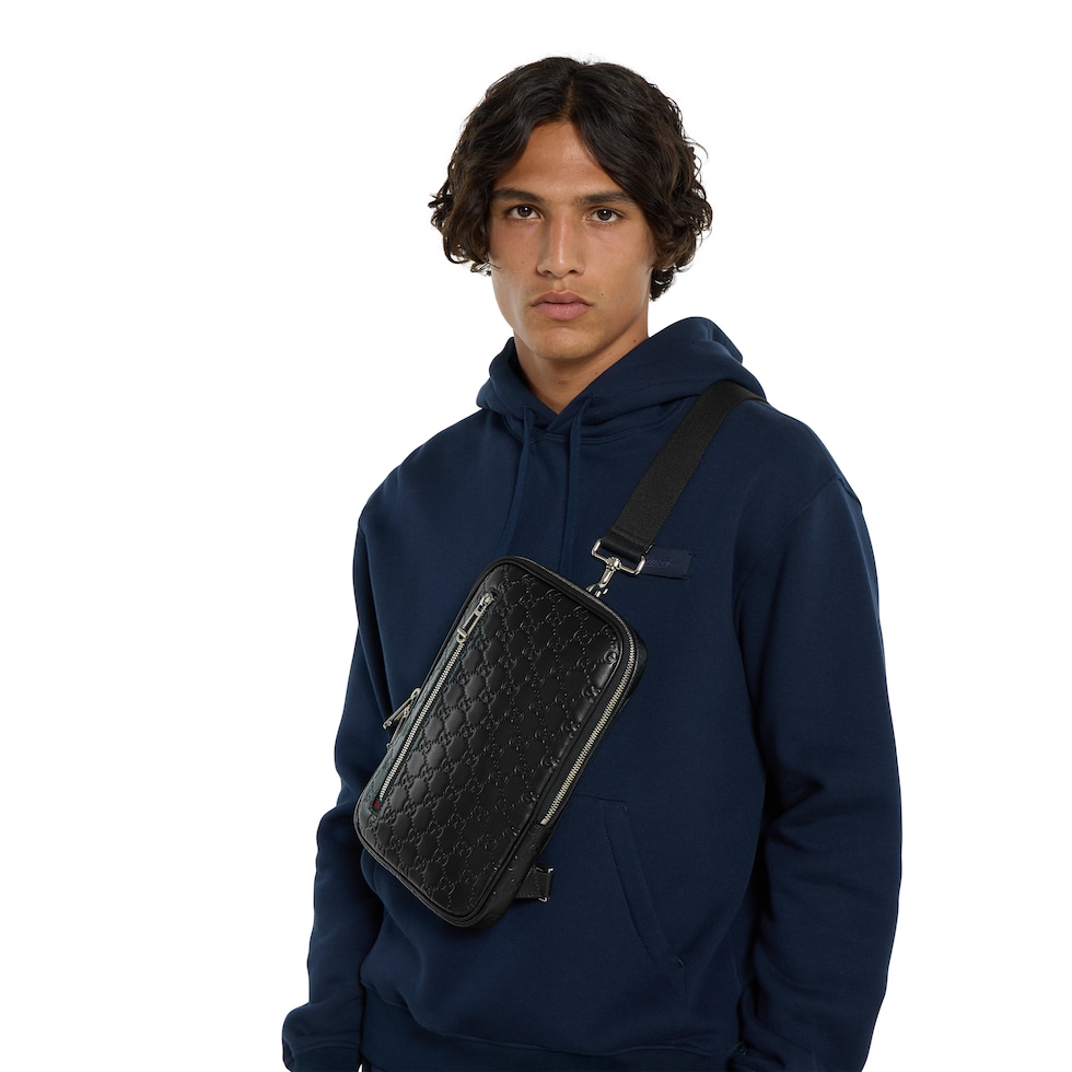 GG Emblem small crossbody bag in black GG leather | GUCCI® UK