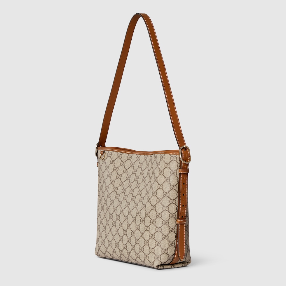 GG Emblem small shoulder bag in beige and brown GG fabric | GUCCI® CH