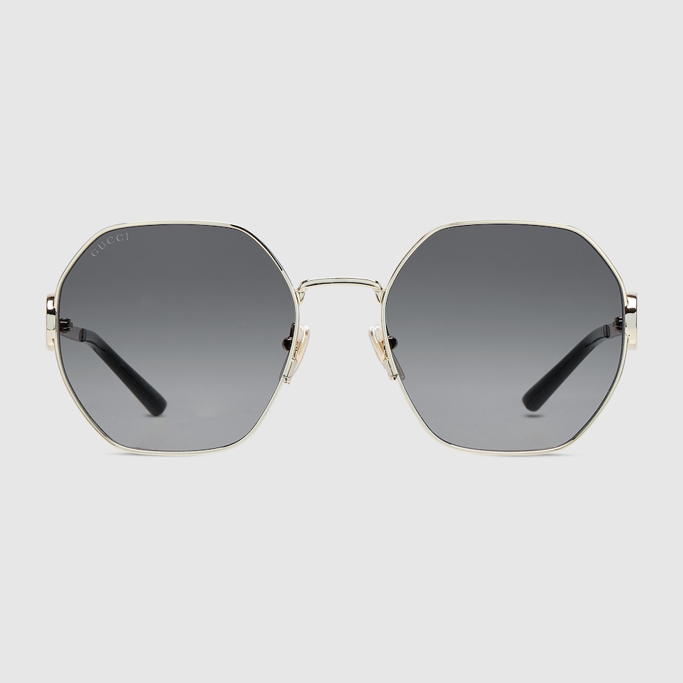 Oval frame sunglasses in gold | GUCCI® SG