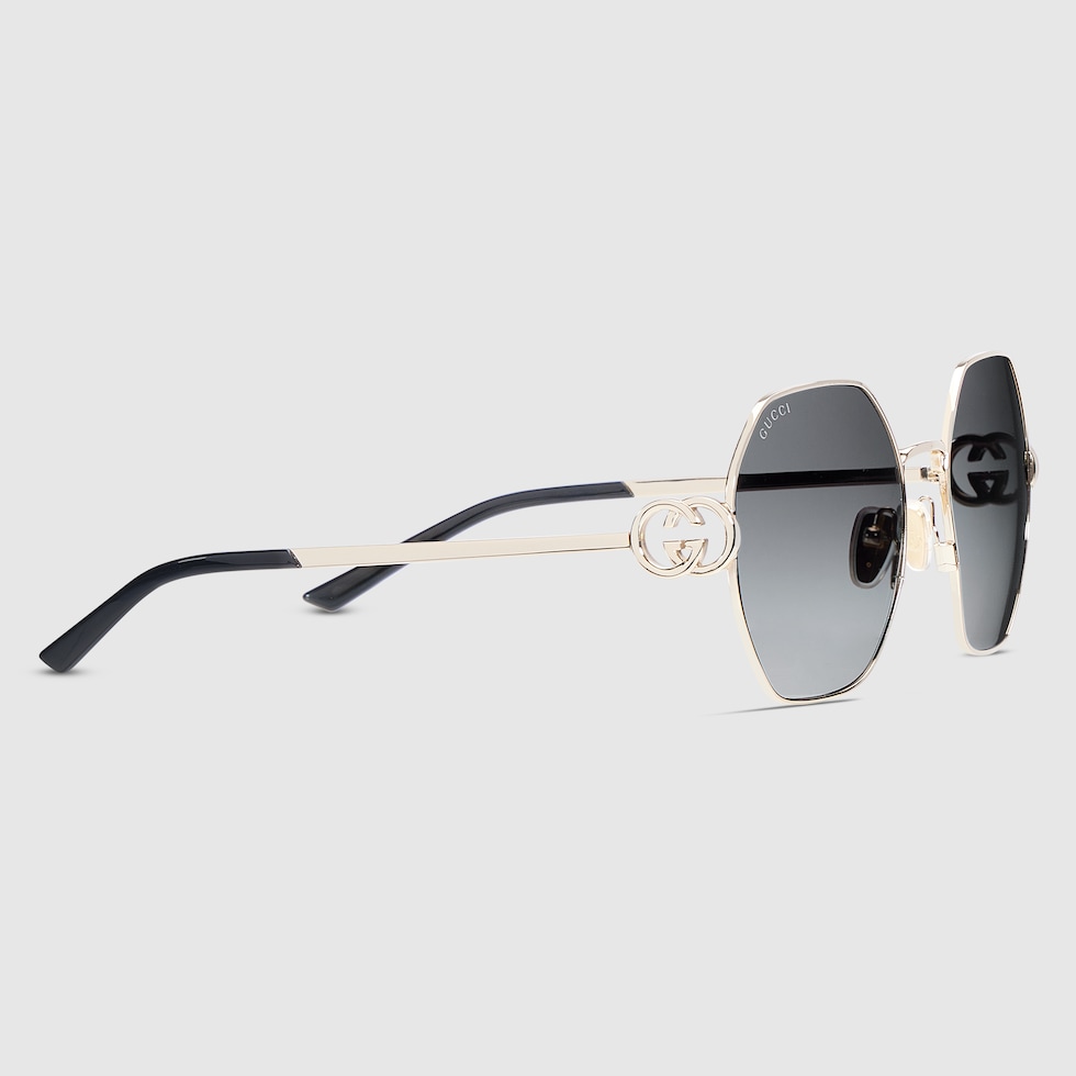 Oval frame sunglasses in gold | GUCCI® SG