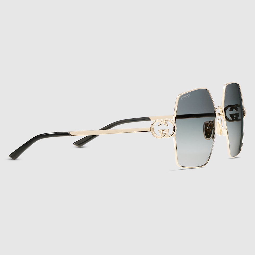 Oval frame sunglasses in gold | GUCCI® SG