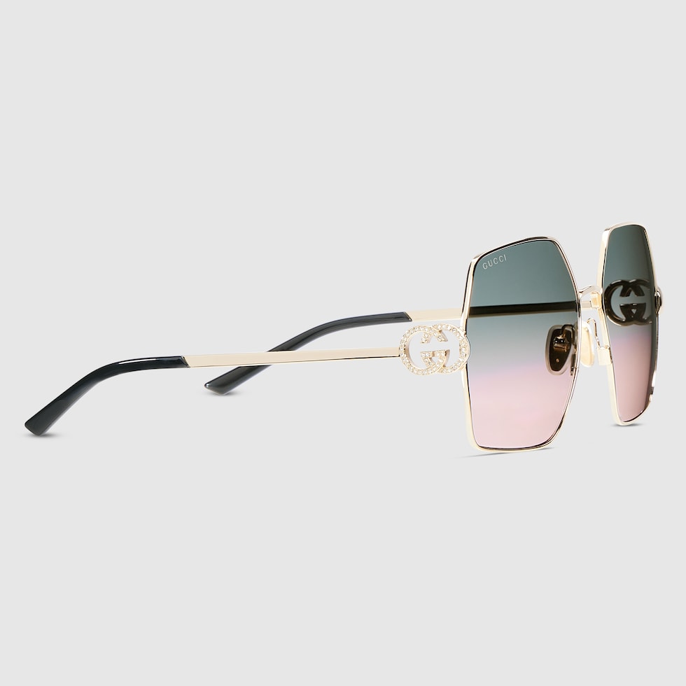 Oval frame sunglasses in gold | GUCCI® US