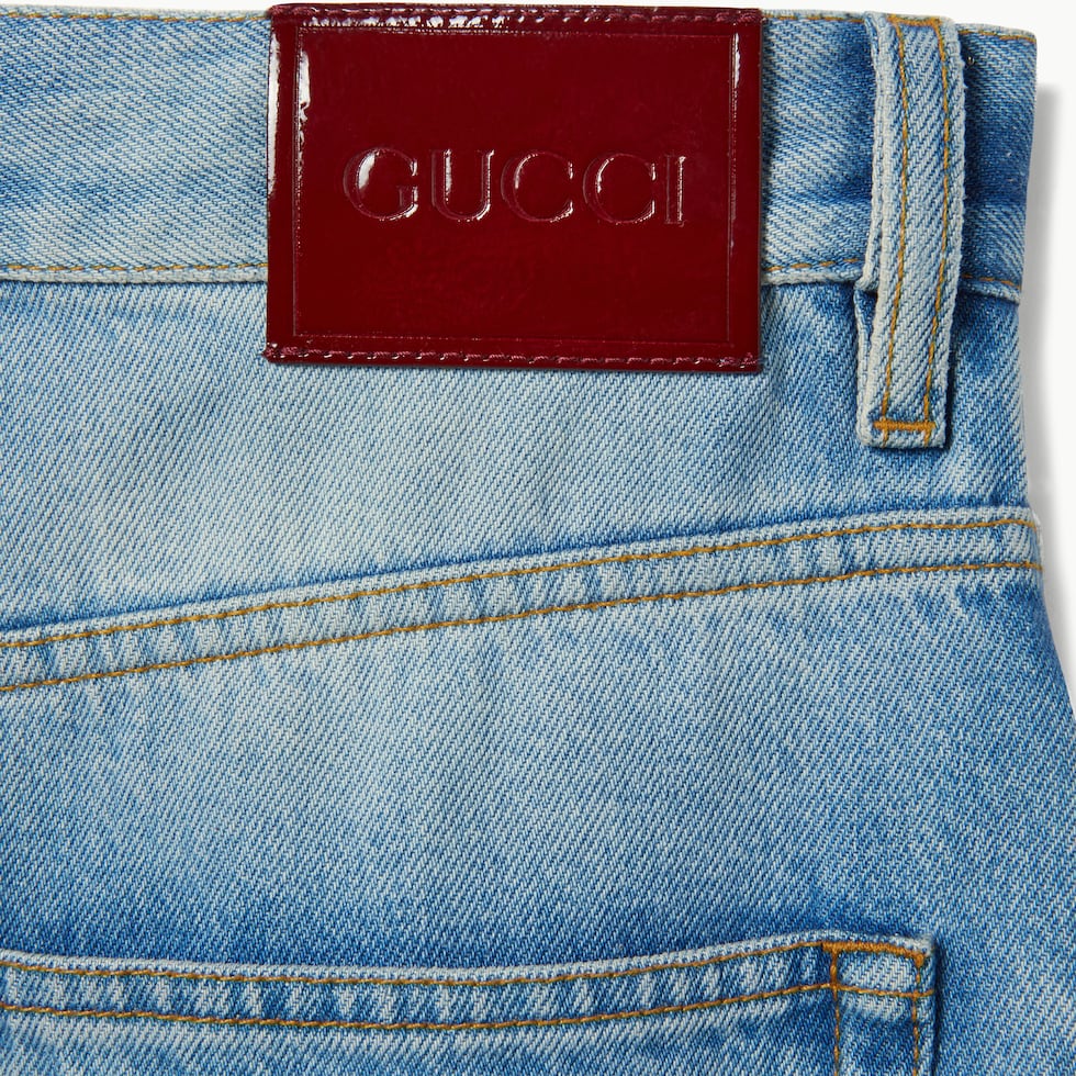 Flared bleached cotton denim pants in light blue | GUCCI® UK
