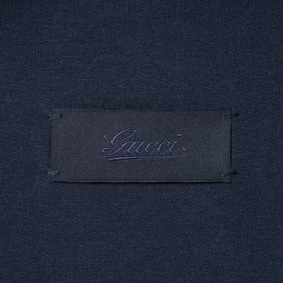 Felpa in jersey di cotone con etichetta in blu | GUCCI® IT