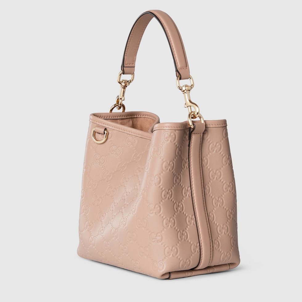 GG Emblem small bucket bag in pink beige GG leather | GUCCI® MX