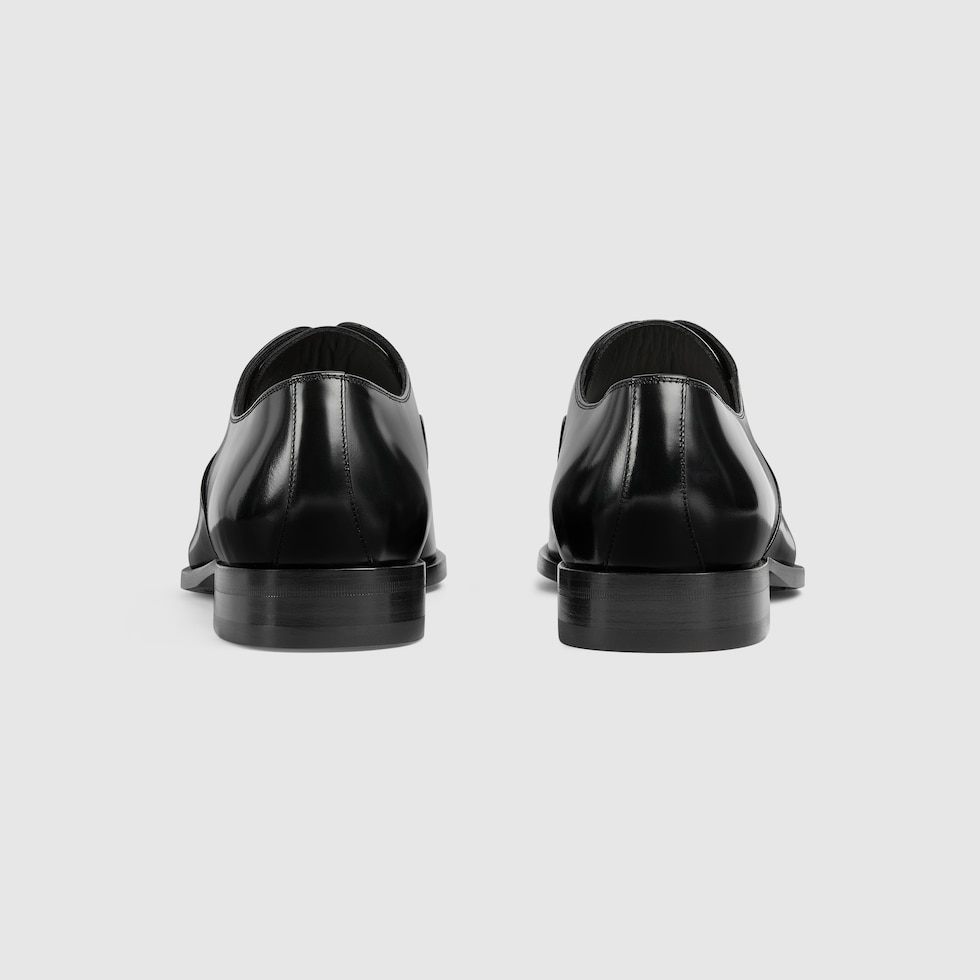 Men's lace-up shoe with topstitch in black leather | GUCCI® US