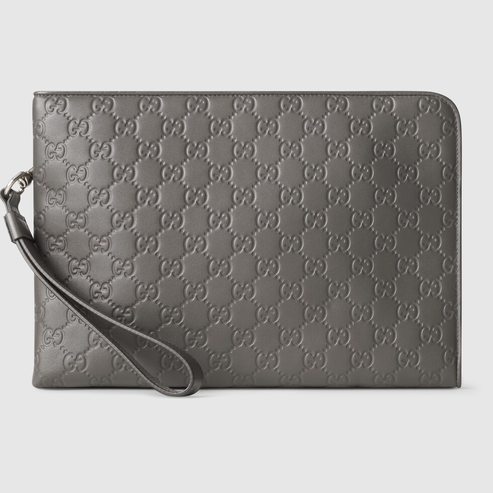 Cartera neceser GG Emblem en GG supreme gris | GUCCI® ES