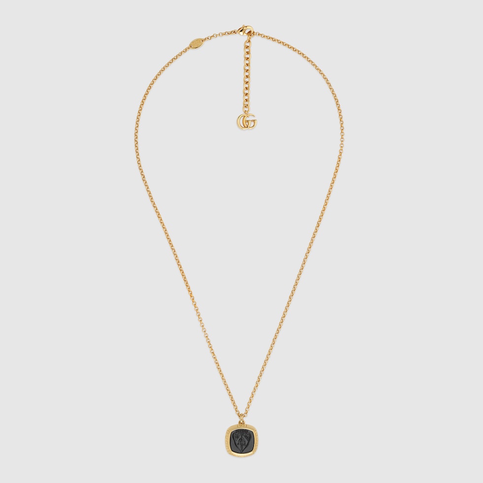 Gucci crest pendant necklace in gold-toned brass | GUCCI® ZA