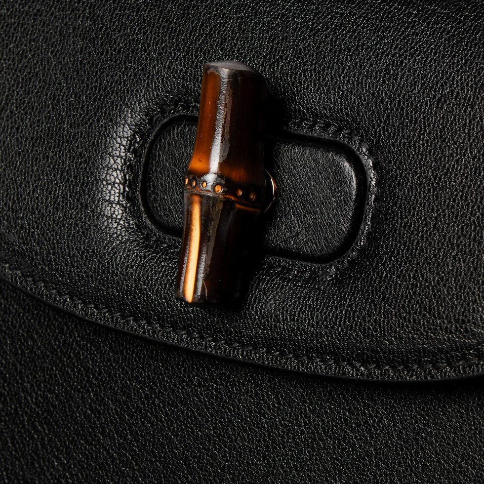 Bamboo mini bag in black leather | GUCCI® RO