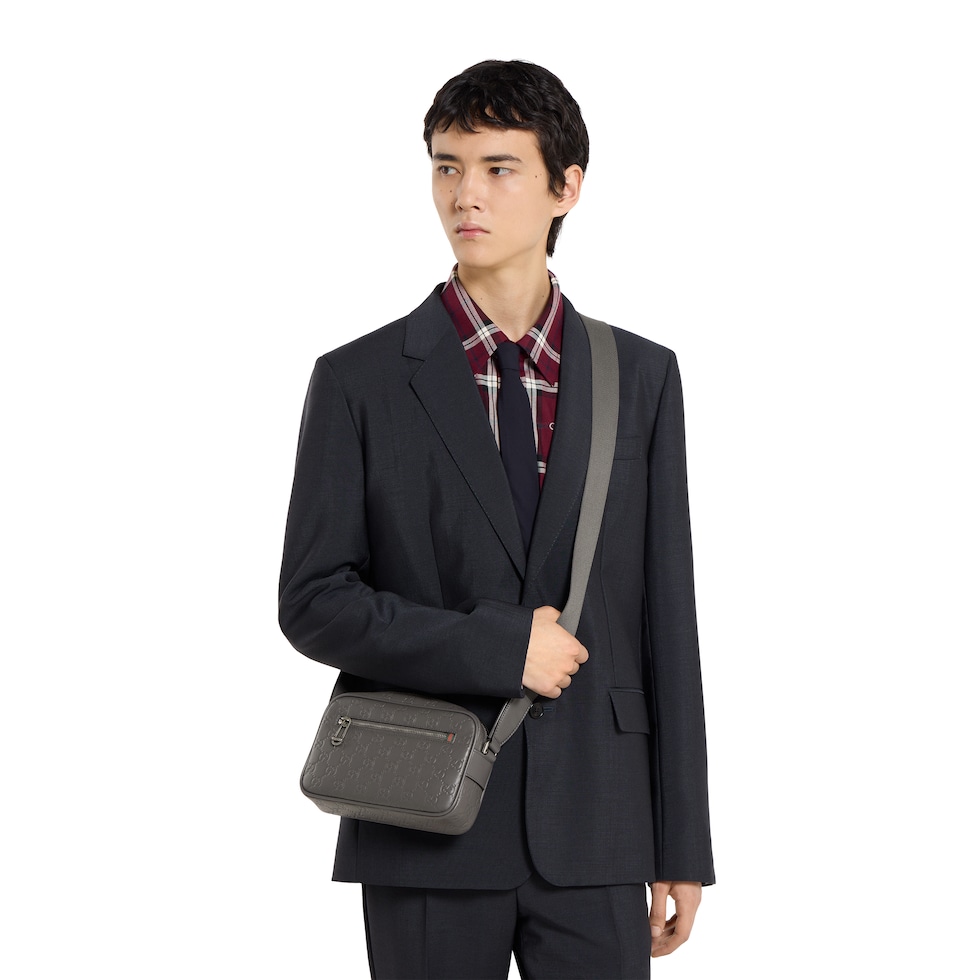 GG Emblem small crossbody bag in grey GG leather | GUCCI® IT