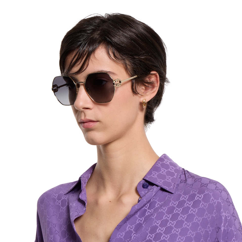 Oval frame sunglasses in gold | GUCCI® SG