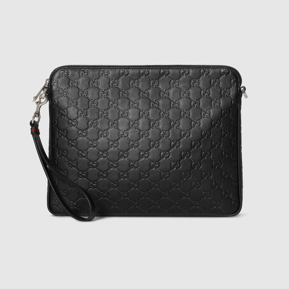 GG Emblem medium crossbody bag in black GG leather | GUCCI® US