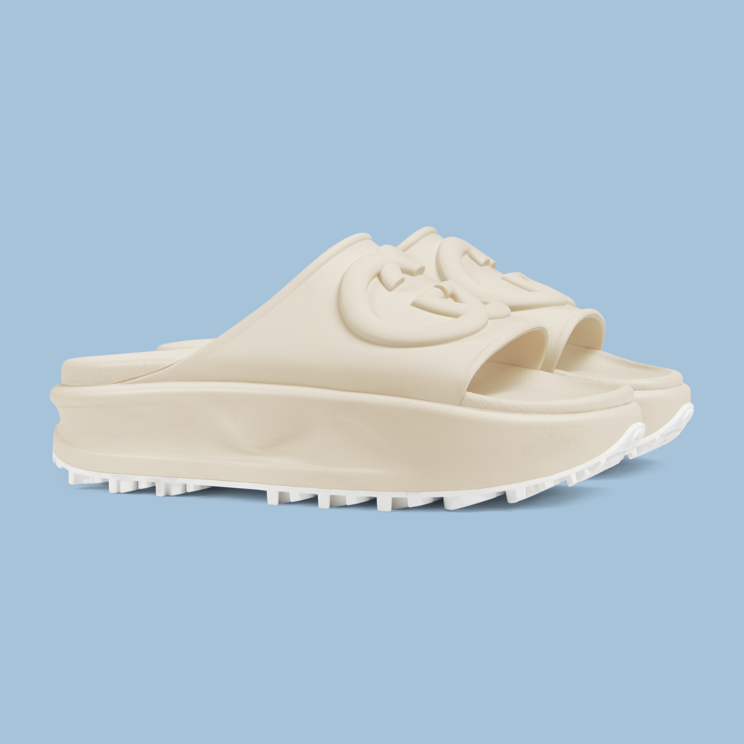 Women's slide sandal with Interlocking G in off-white rubber | GUCCI ...