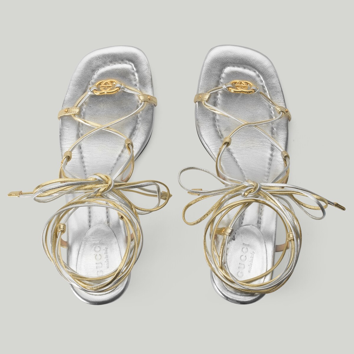 Women's Interlocking G strappy sandal in Silver Leather | GUCCI® SI