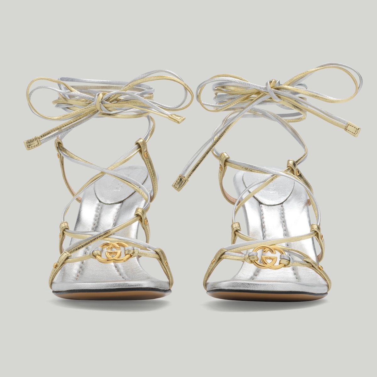 Women's Interlocking G strappy sandal in Silver Leather | GUCCI® SI