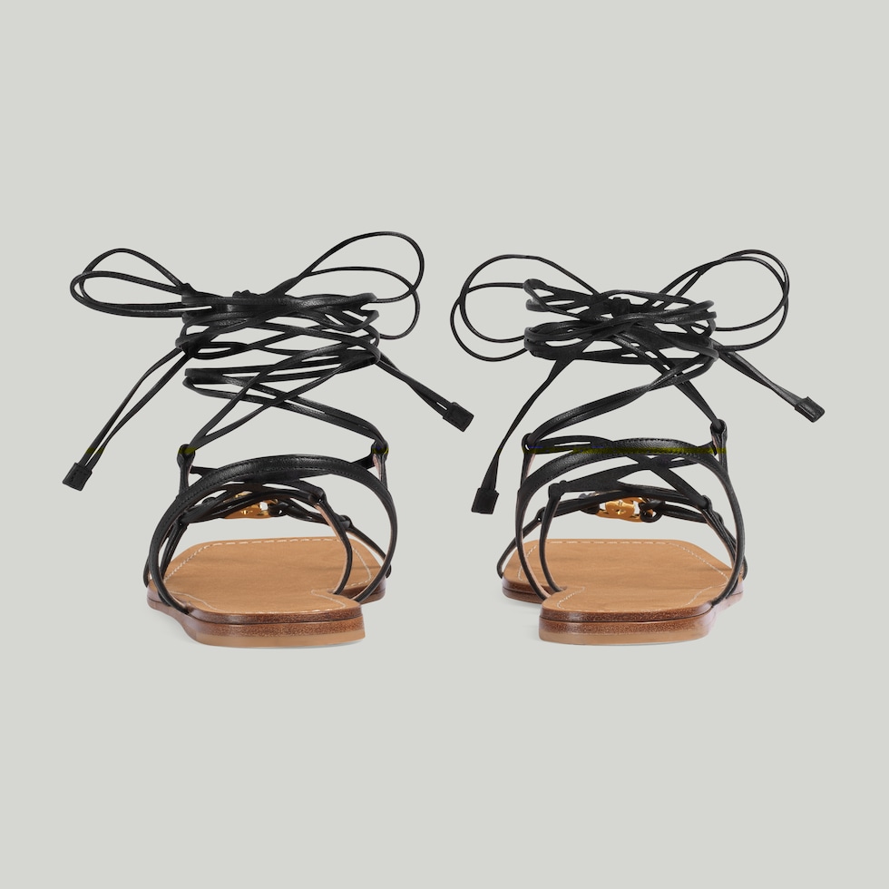 Women's Interlocking G strappy sandal in black leather | GUCCI® AE