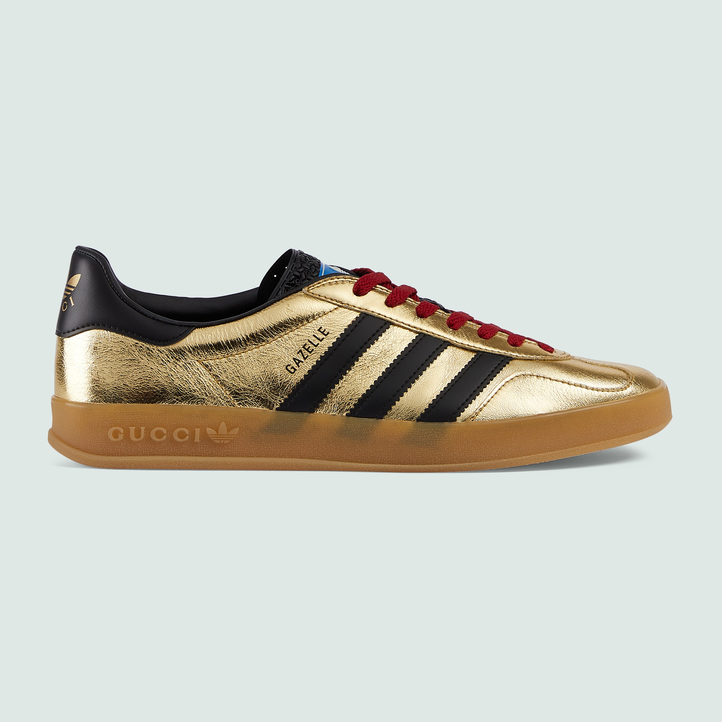 adidas x Gucci men's Gazelle sneaker in metallic gold leather | GUCCI® US