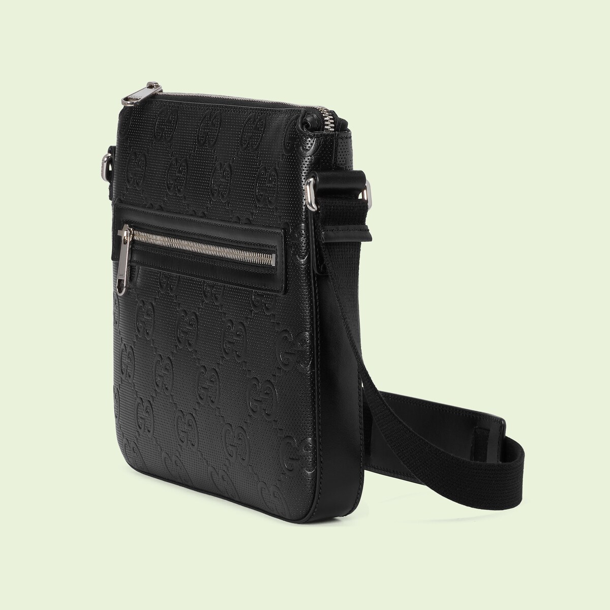 GG embossed small messenger bag in black leather | GUCCI® NZ