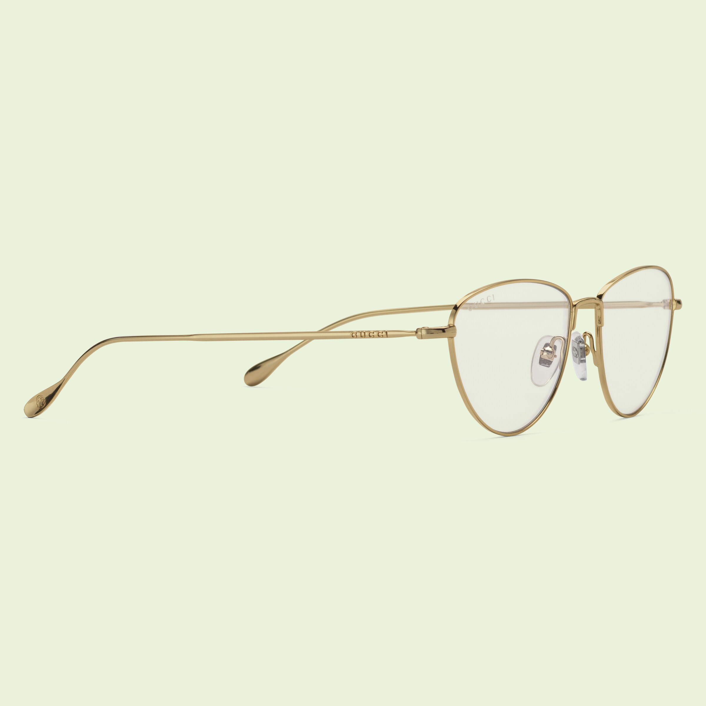 Cat-eye sunglasses with photochromic lens in gold-toned metal | GUCCI ...